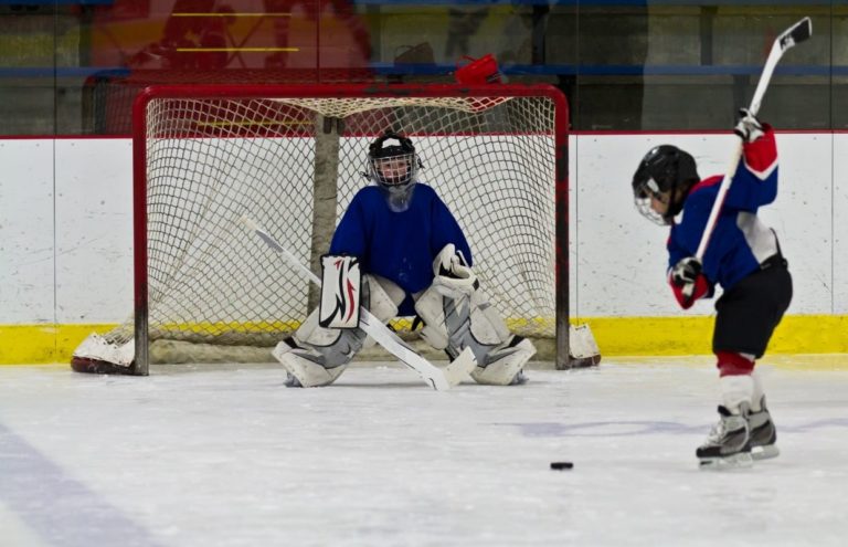 How Do You Teach A Kid To Shoot A Hockey Puck? - Banff Hockey School